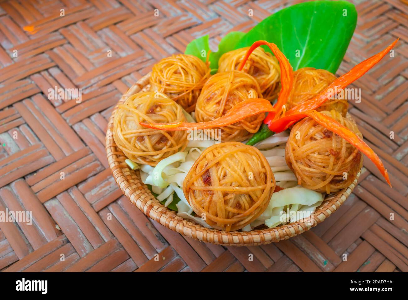 Deep fried wrapped pork with noodle. Traditional thai food as known as Mhoo Sarong Stock Photo ...