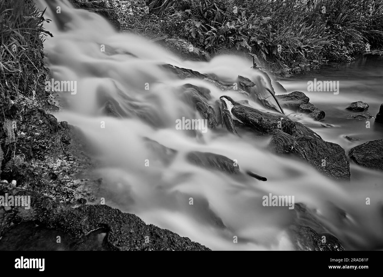The force of the water when crossing the waterfall Stock Photo - Alamy