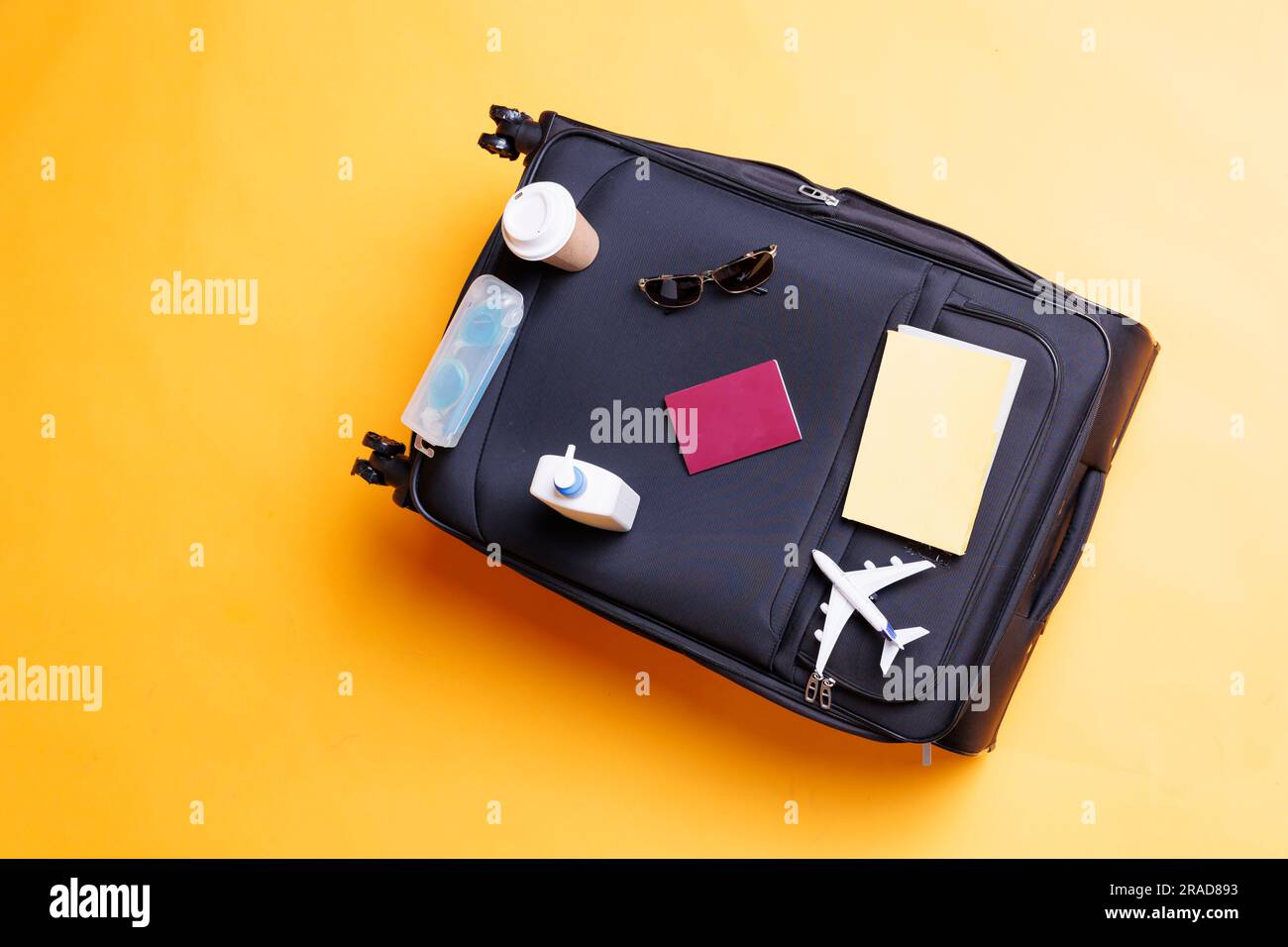 Big suitcase trolley bag in studio, empty space with luggage filled ...