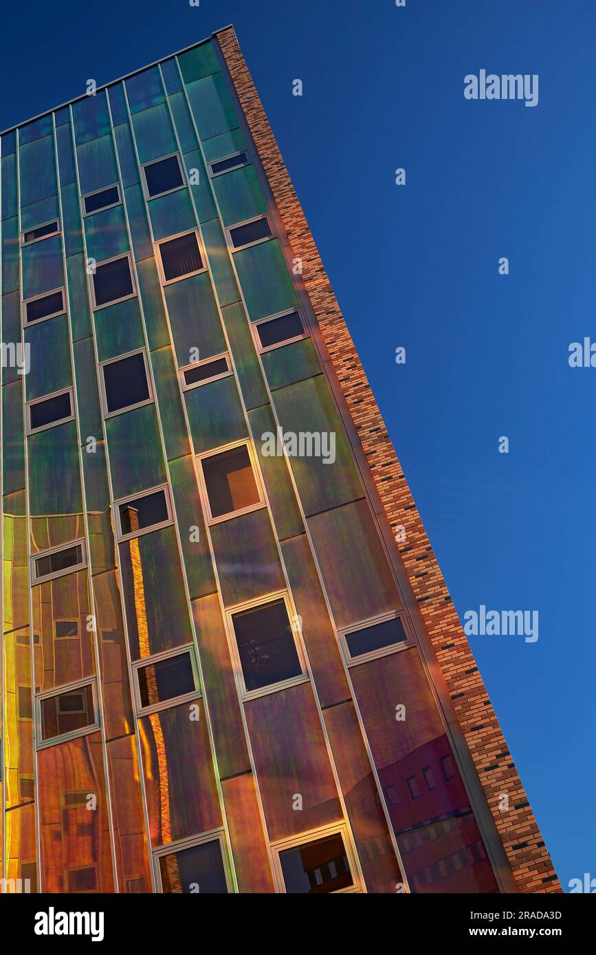 Amazing colourful reflective facade of a modern office building in sun ...