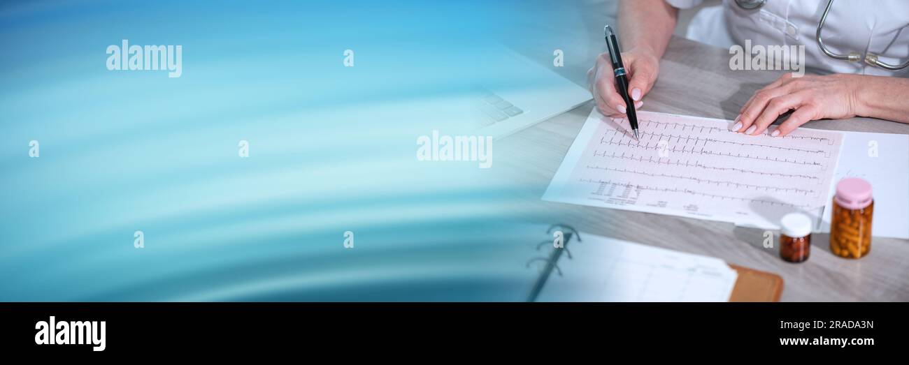 Female cardiologist examining an ecg graph in medical office; panoramic ...