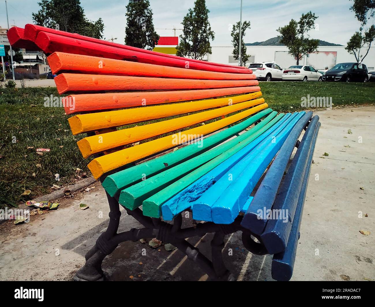 Wooden bench with the rainbow colors Stock Photo - Alamy