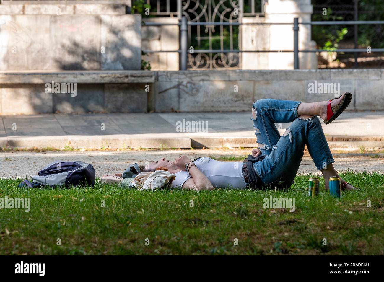 drunk woman sleeping it off in a park in split, croatia. down and out ...