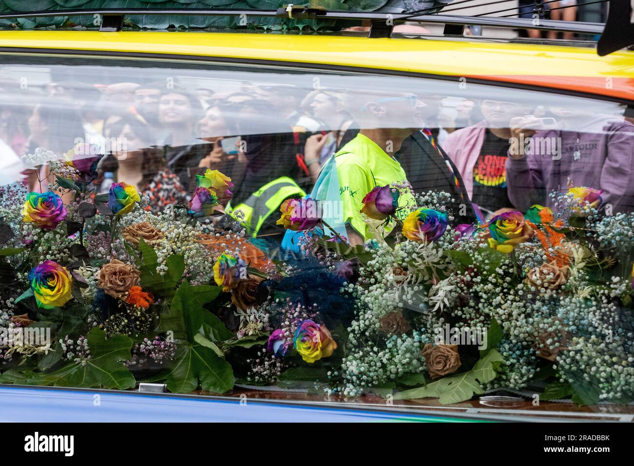 London, UK. 1st July, 2023. A rainbow-coloured hearse takes part in the ...