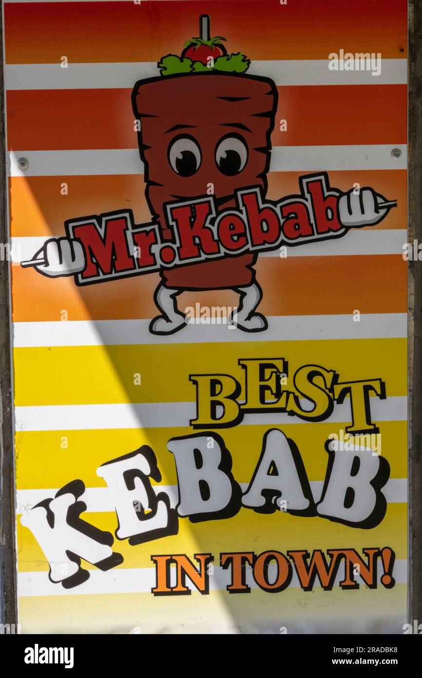 colourful sign advertising kebabs, mr kebab shop, best kebab in town ...