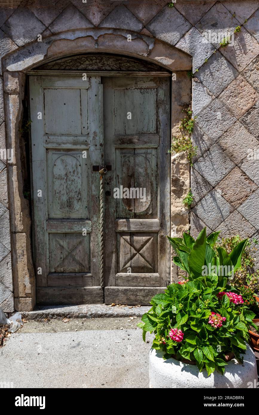 heavy old large oak door on an historic building with attractive ...