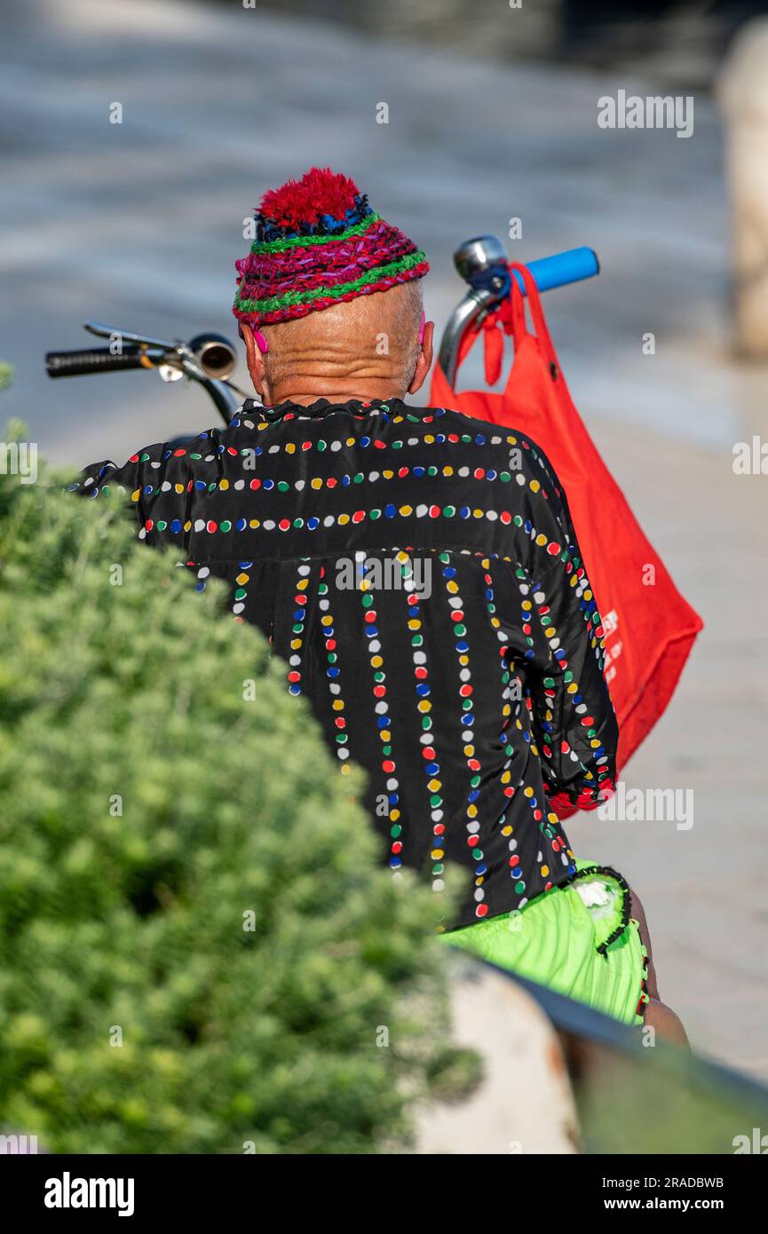 old tanned man sitting on a bench in grad split, croatia, older man ...