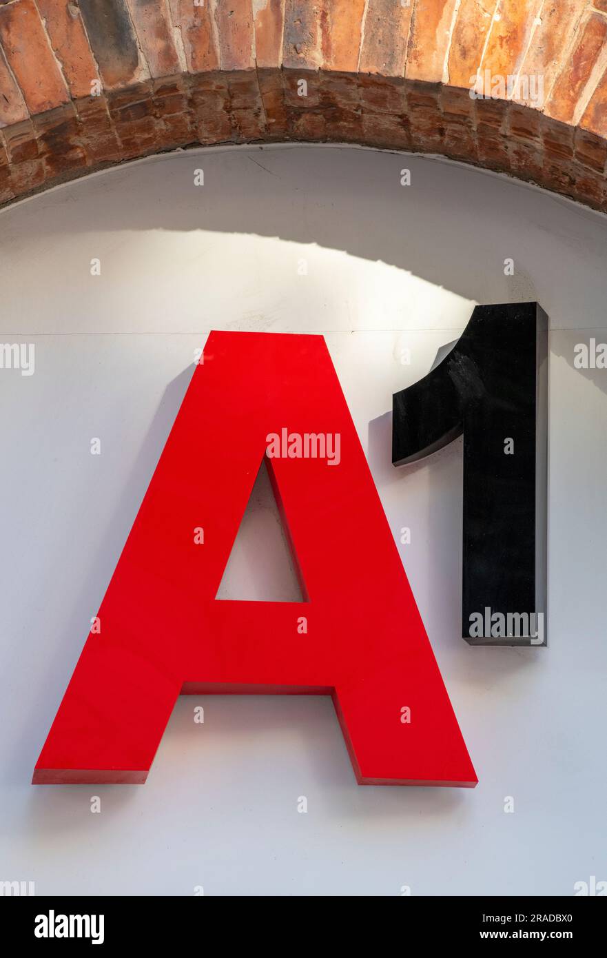 the sign A1 in red and black alphanumeric signage Stock Photo - Alamy