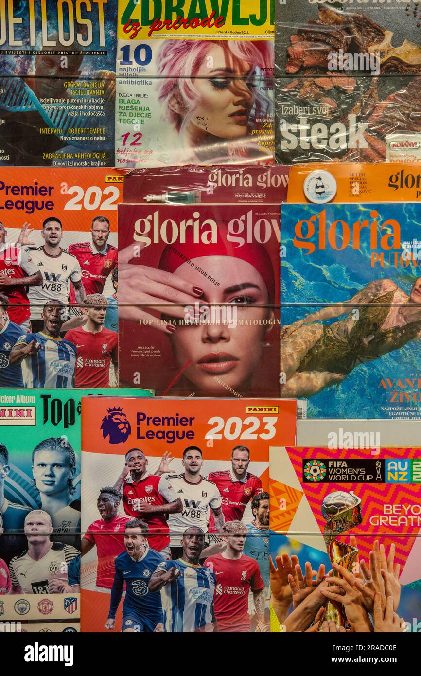 rack full of colourful magazines outside of a croatian news stand in ...