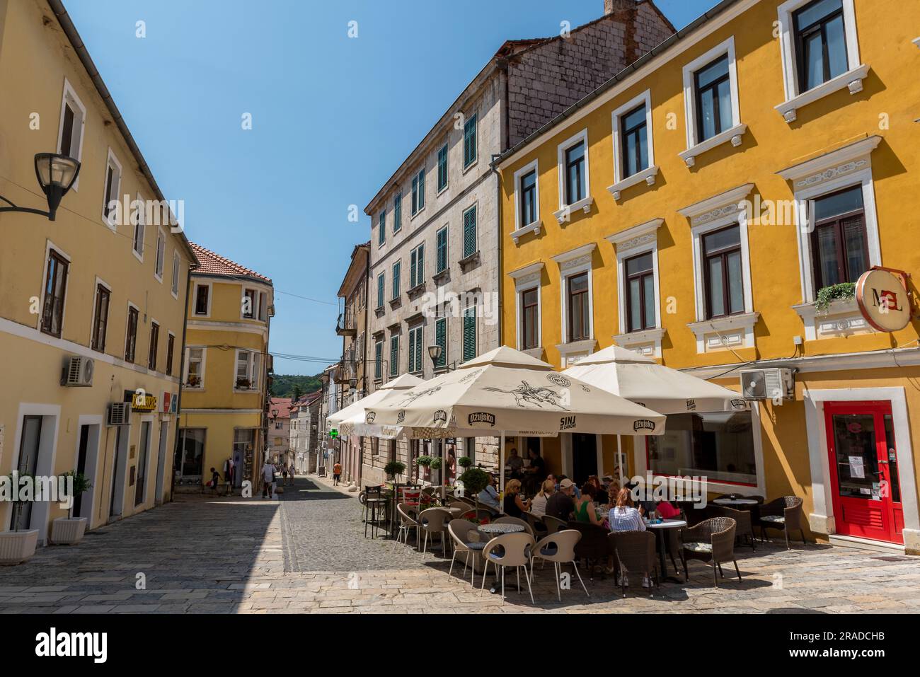 the main street in sinj near to split in dalmatia, croatia, cafeterias ...