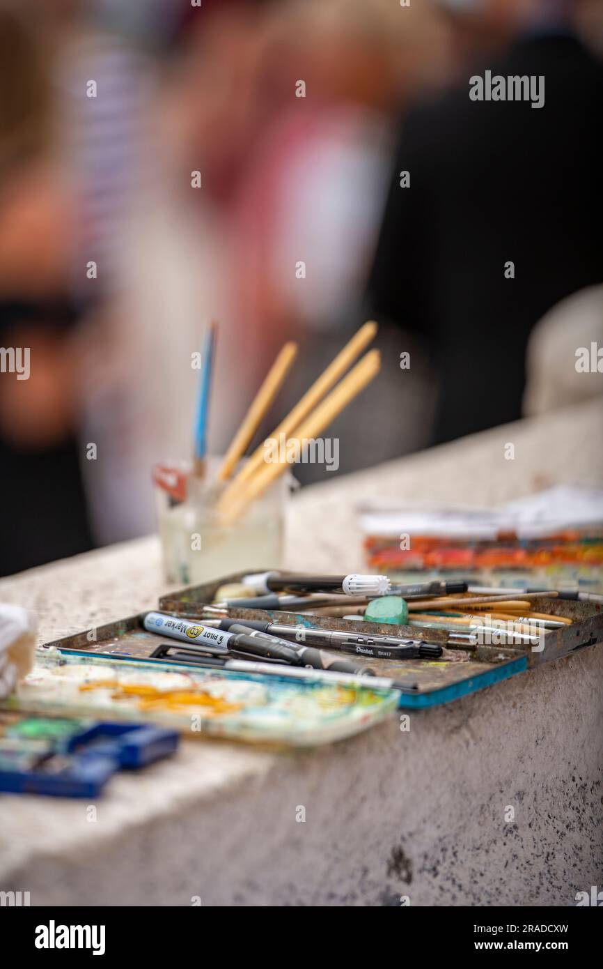 box or palette of artists watercolours with brushes and tubes of paint ...
