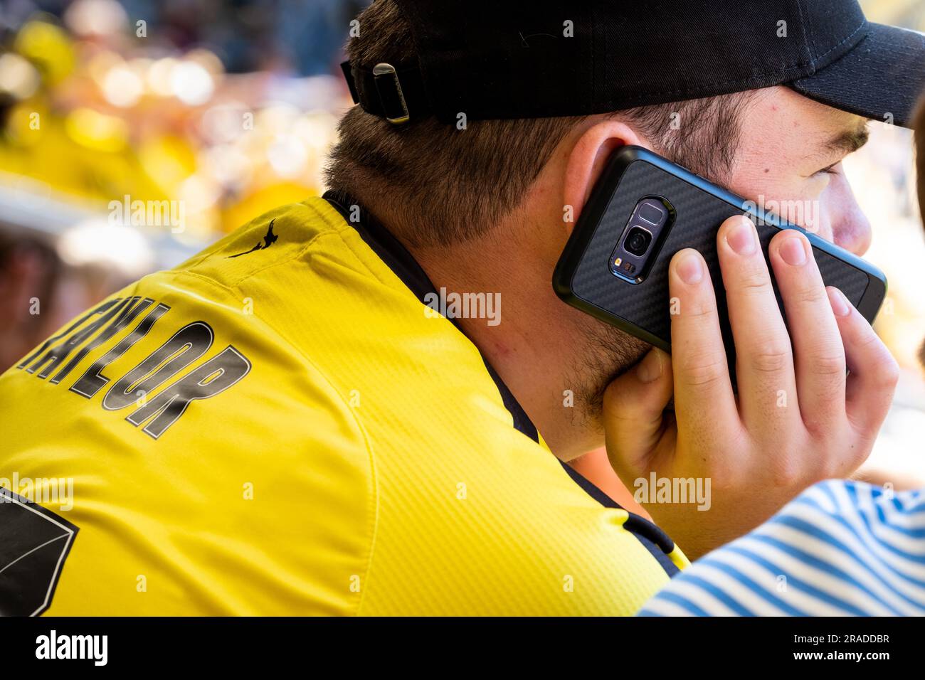 Football fan on phone in stadium hi-res stock photography and images ...