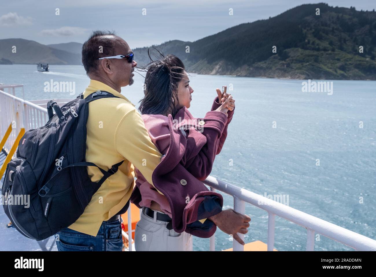 Couple enjoy amazing views on Queen Charlotte Sound on Wellington to ...