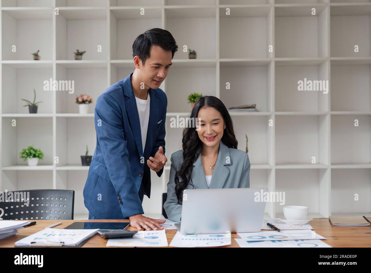 Conversation between two businesswomen hi-res stock photography and ...