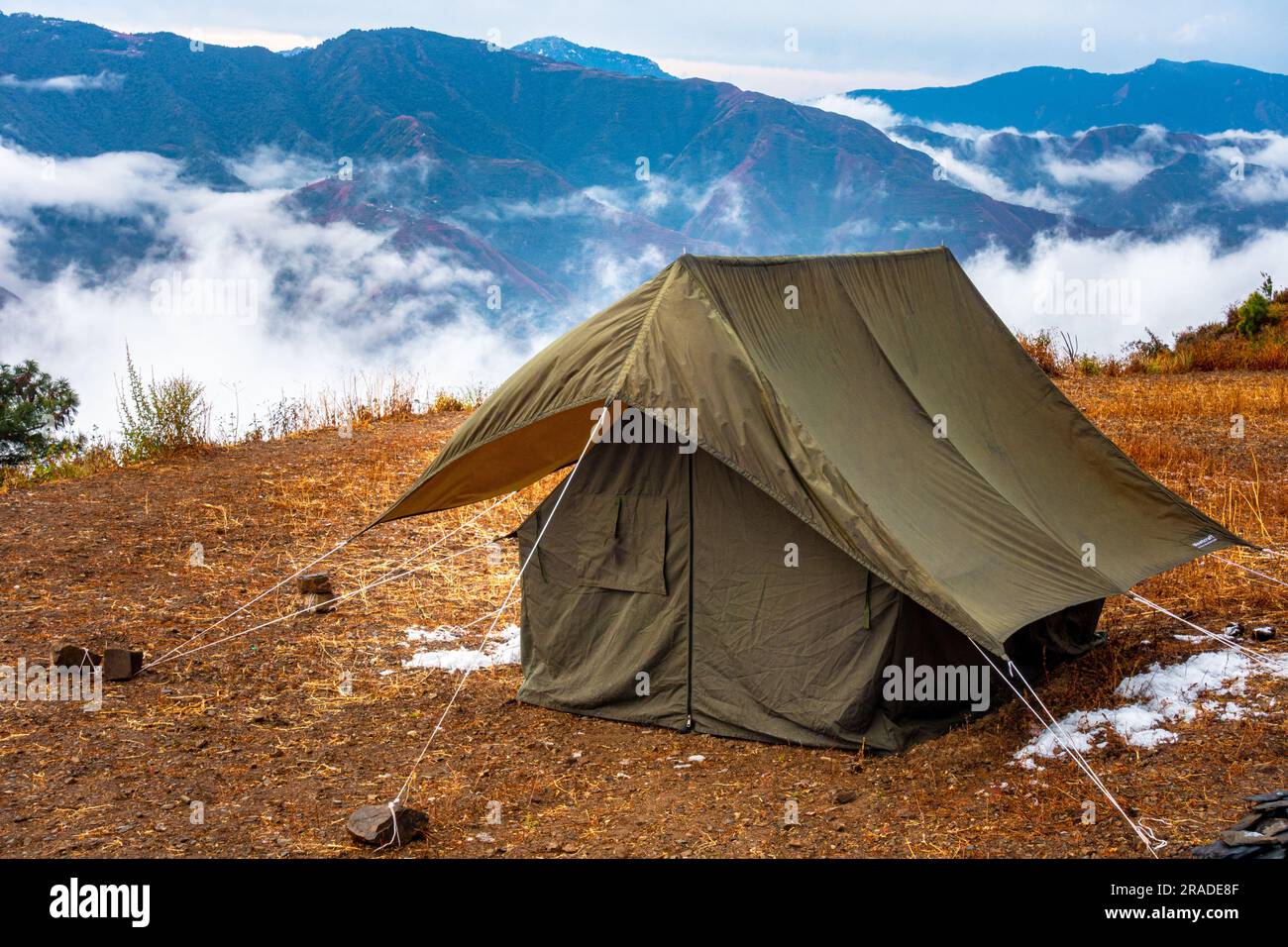 Camps with orange outer fly on a Camp Ground. Nag Tibba, Himalayan ...