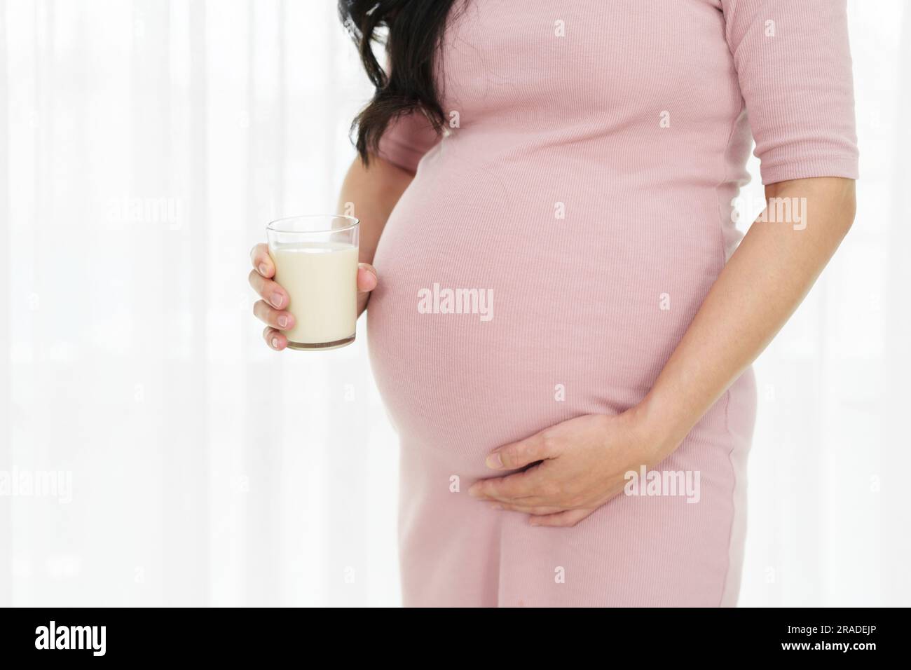 Woman milk belly tummy calcium hi-res stock photography and images - Alamy