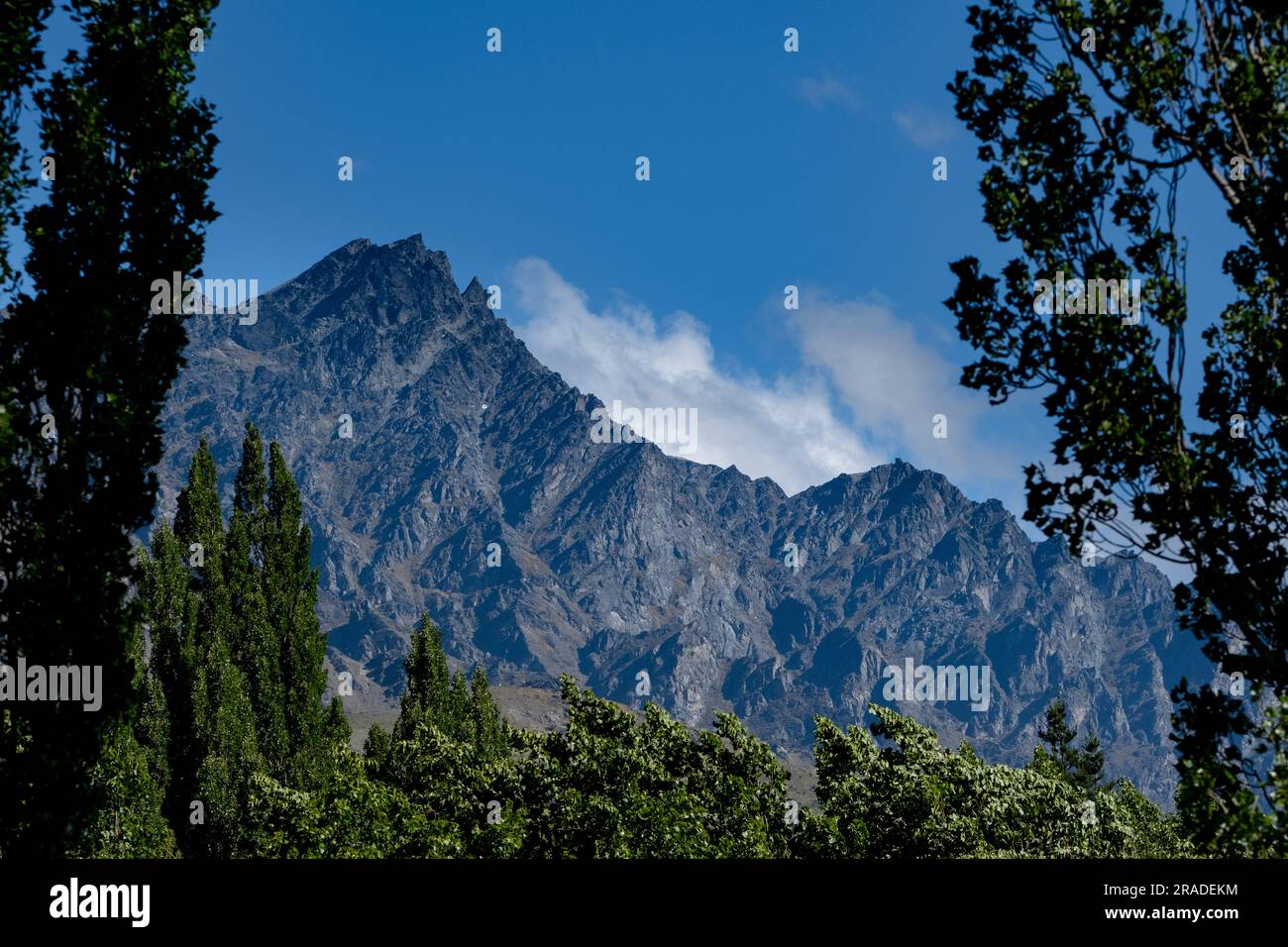 The iconic Remarkables Mountains viewed above the popular cycle path ...