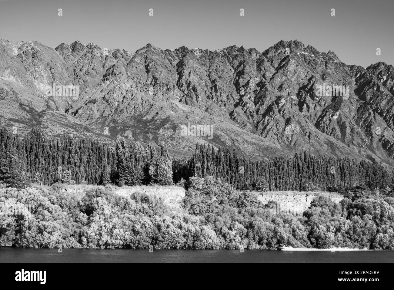 The iconic Remarkables Mountains viewed above the popular cycle path ...