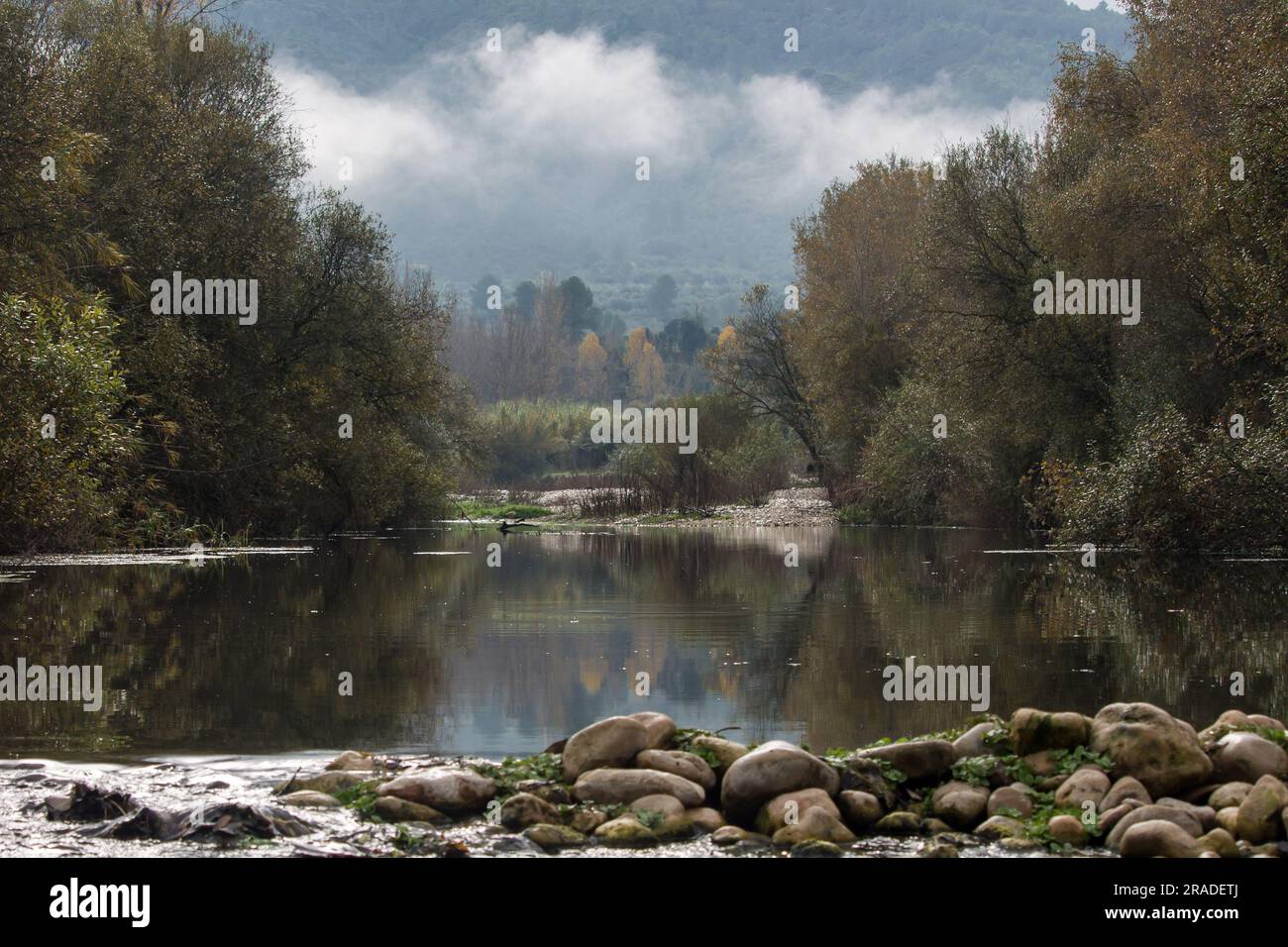 Serpis river as it passes through the town of Lorxa in Spain Stock ...