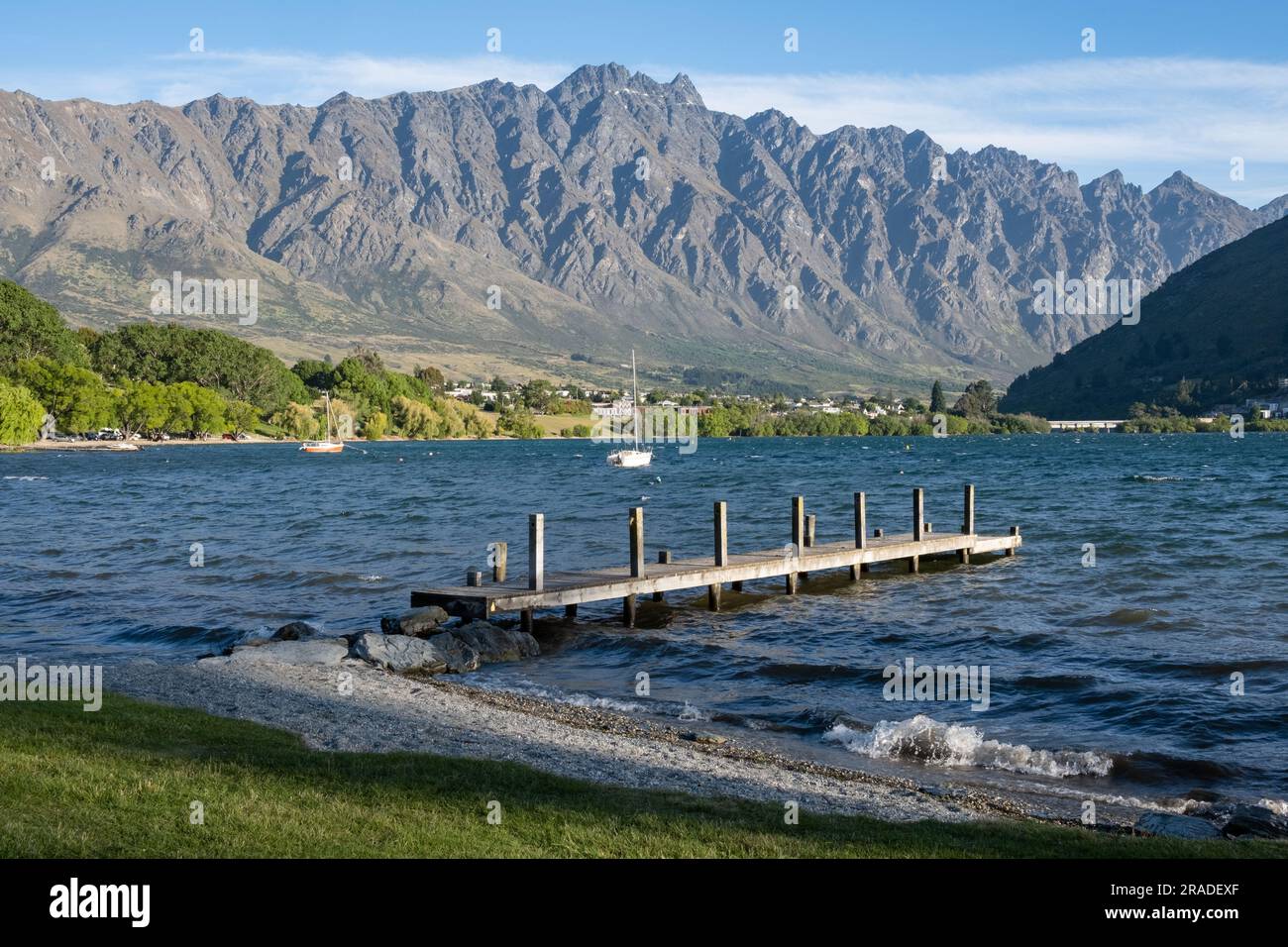 The iconic Remarkables Mountains viewed above Frankton and a Lake ...