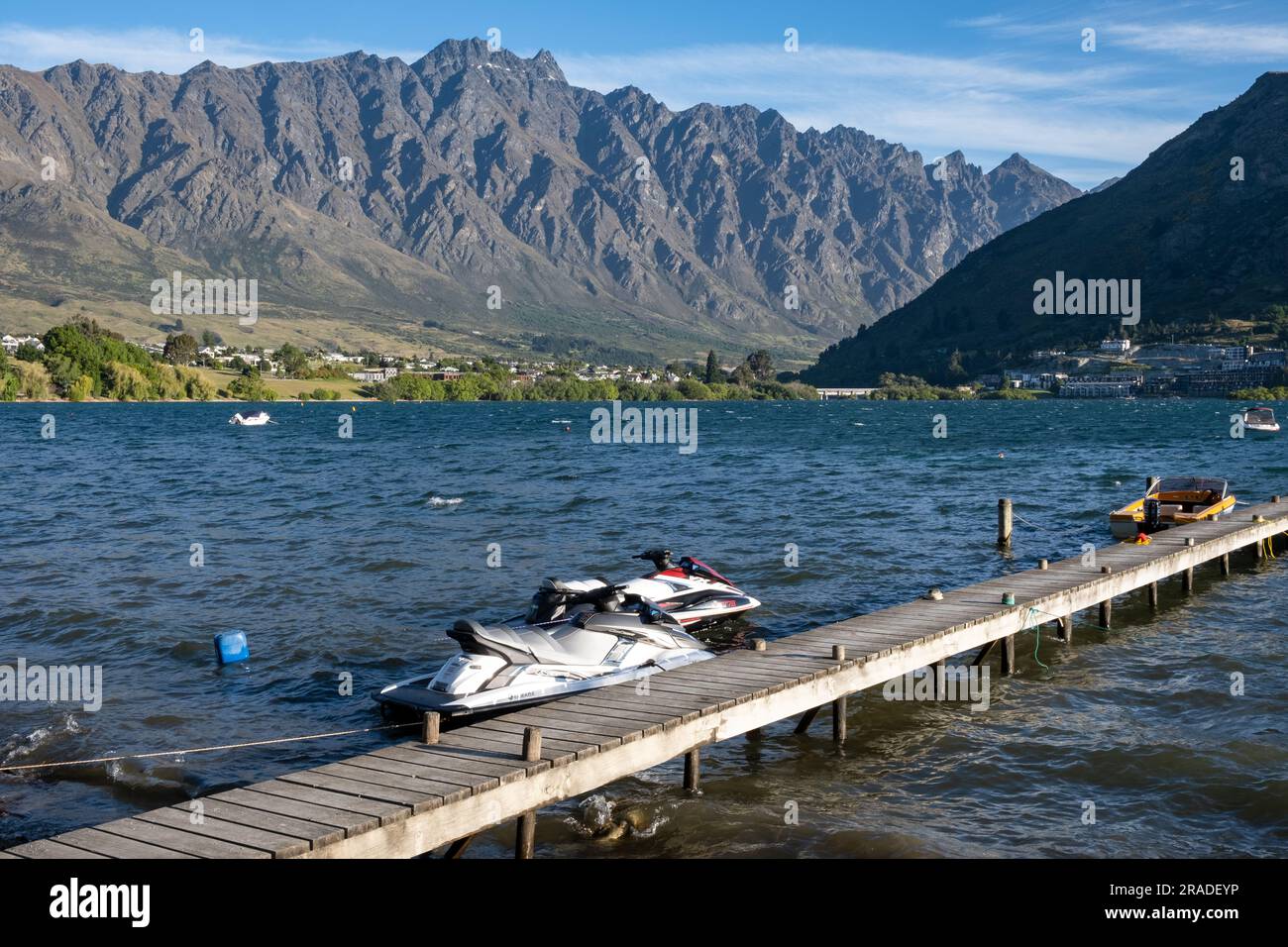 The iconic Remarkables Mountains viewed above Frankton and a Lake ...