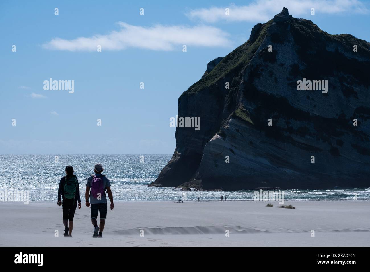 Tourists at Wharariki Beach, New Zealand, South Island's Most Northerly ...