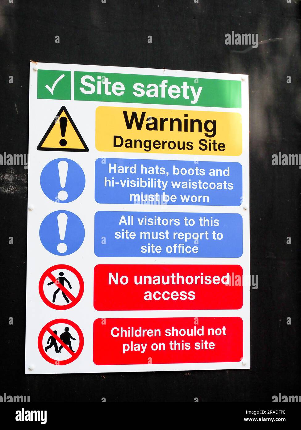 Close up of a building site health and safety warning sign Stock Photo ...