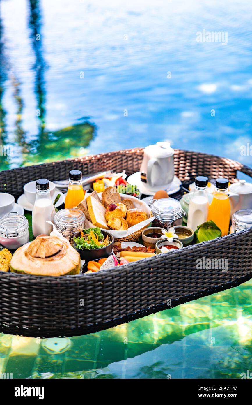 Floating breakfast in pool in Lamai beach resort in Koh Samui, Thailand ...