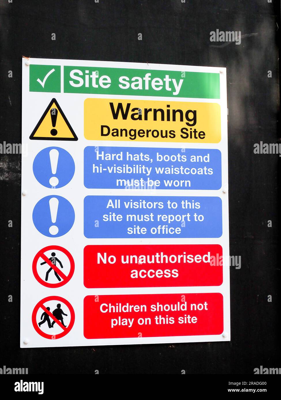 Close up of a building site health and safety warning sign Stock Photo ...
