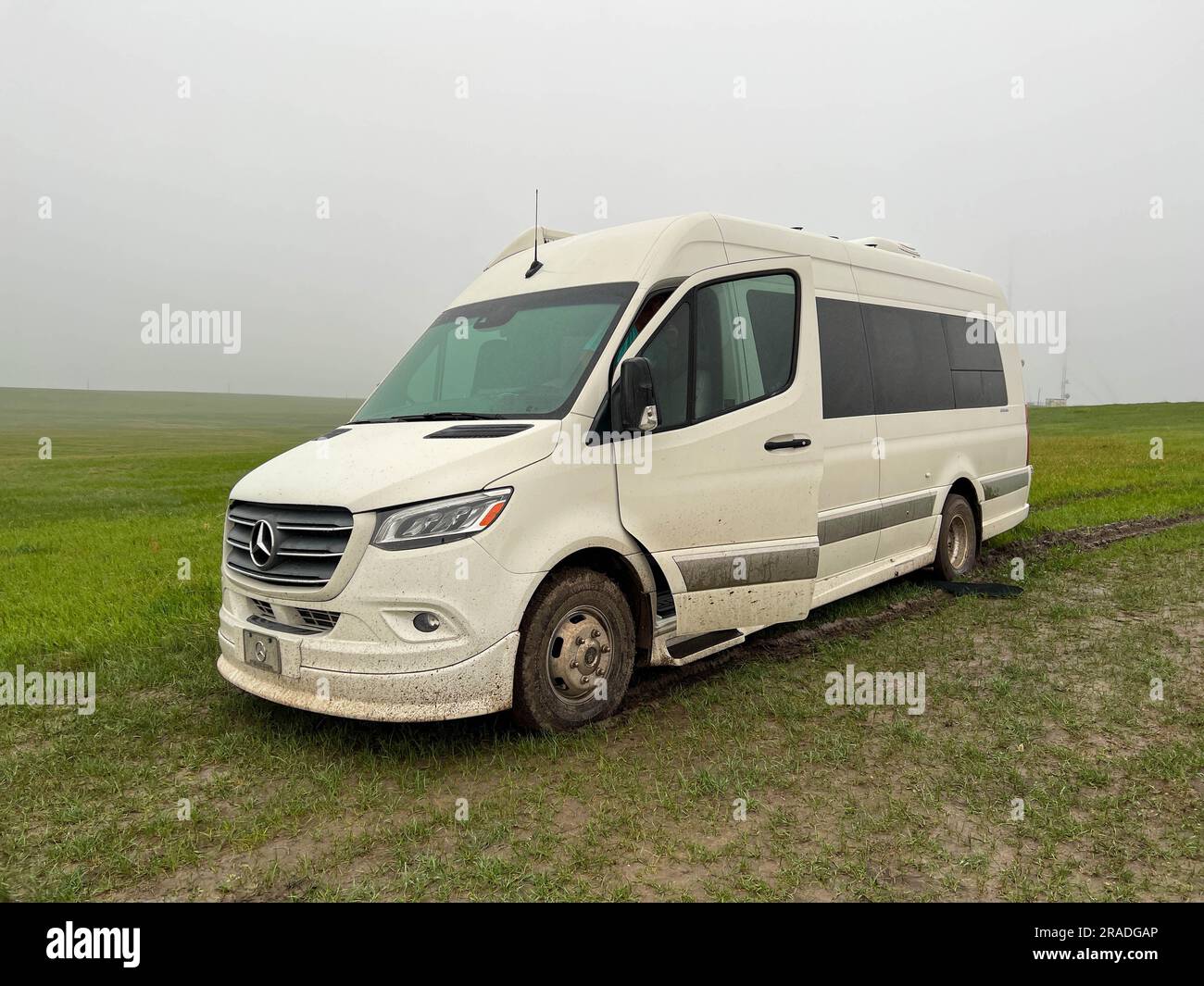 Wall, SD USA - May 13, 2023: A RV Sprinter Van stuck in the mud in the ...
