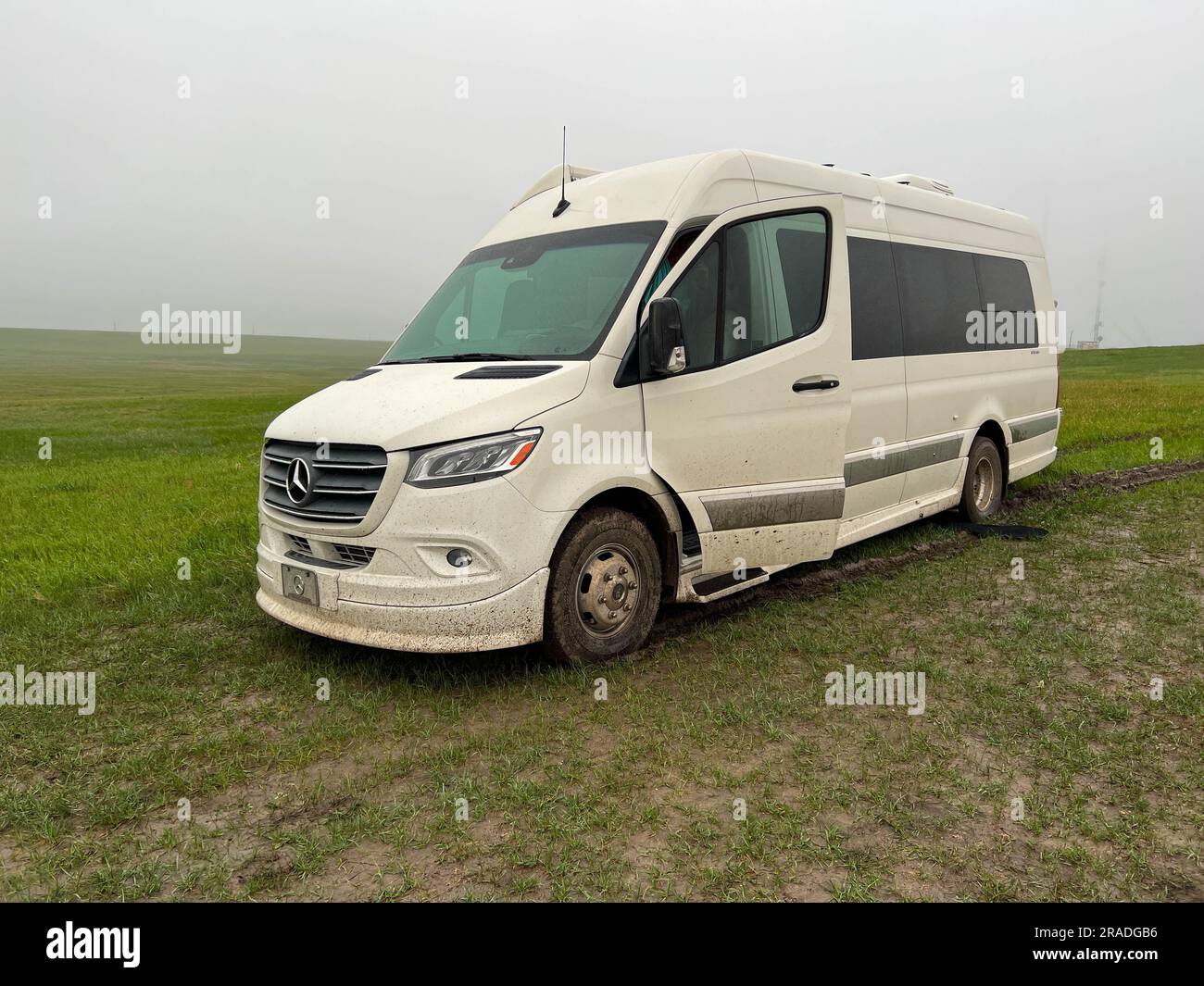 Wall, SD USA - May 13, 2023: A RV Sprinter Van stuck in the mud in the ...
