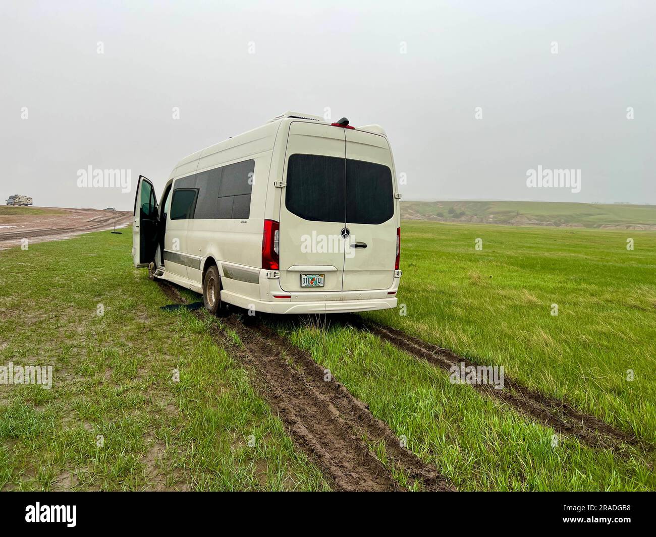 Wall, SD USA - May 13, 2023: A RV Sprinter Van stuck in the mud in the ...