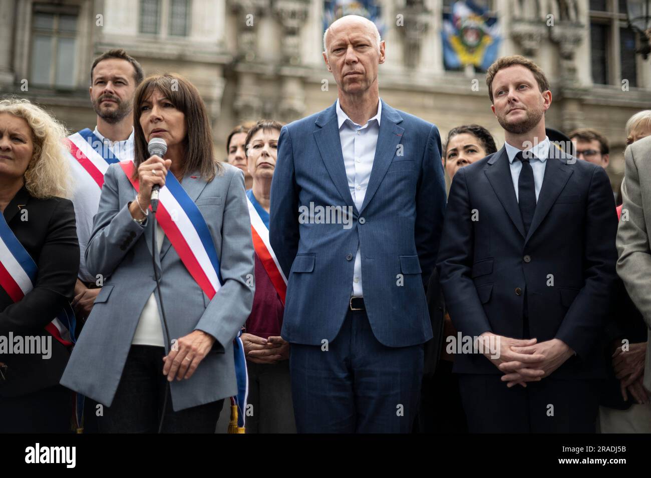 Paris, France. 03rd July, 2023. Paris' mayor Anne Hidalgo (C) and ...