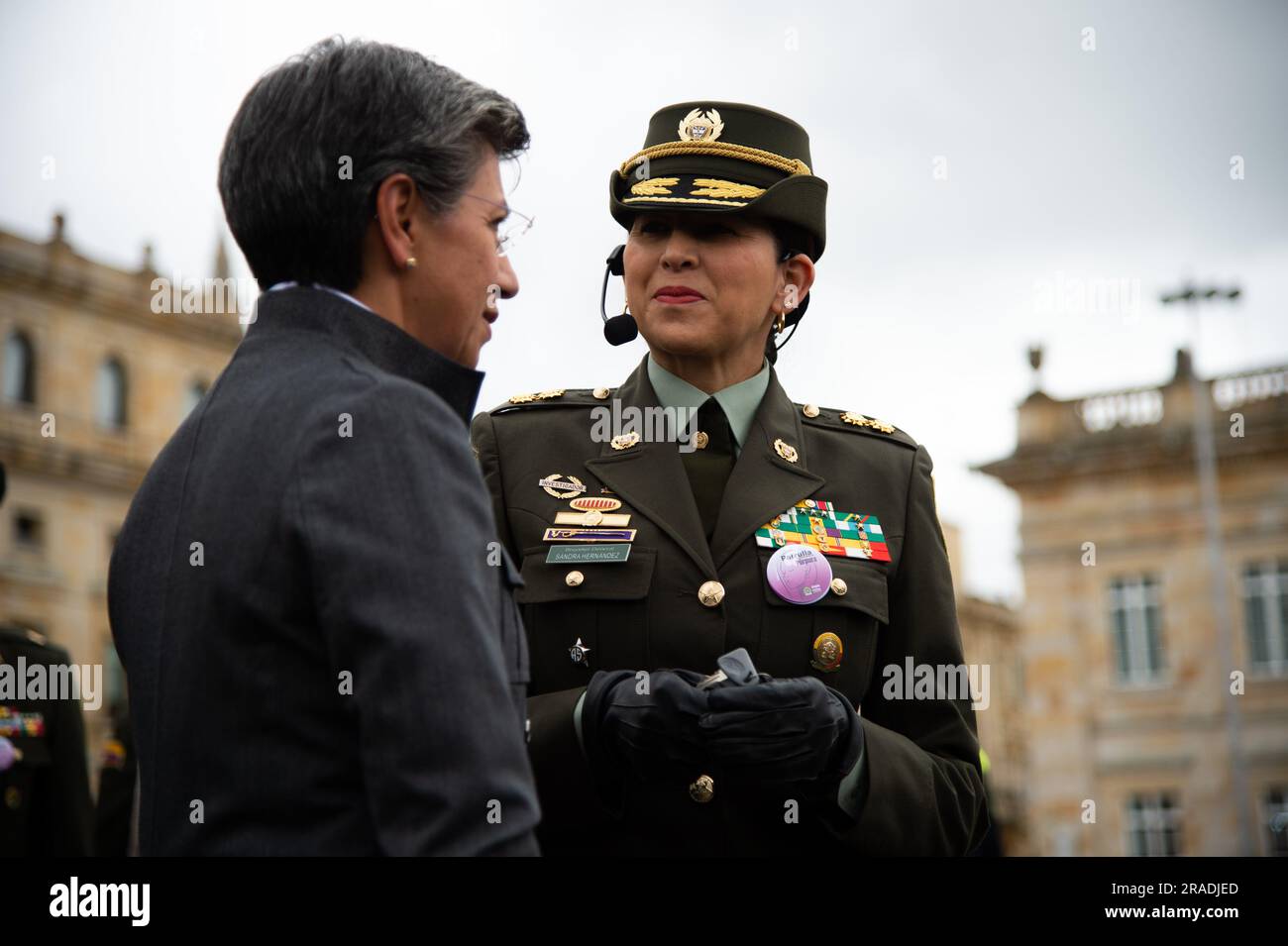 Bogota's mayor Claudia Lopez (L) greets the new commander of Bogota's police Brigadier General ...