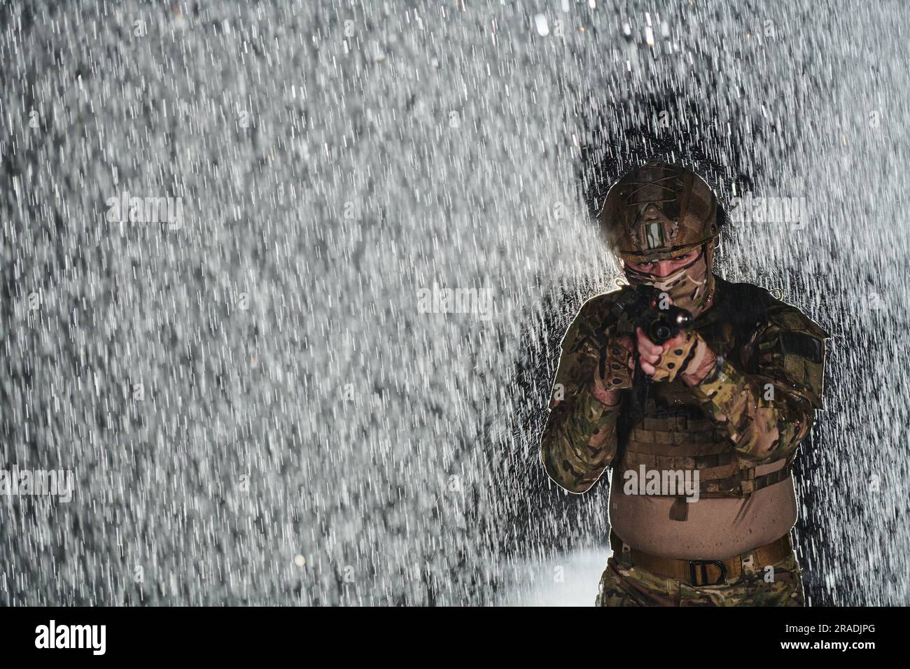 Army soldier in Combat Uniforms with an assault rifle, plate carrier ...