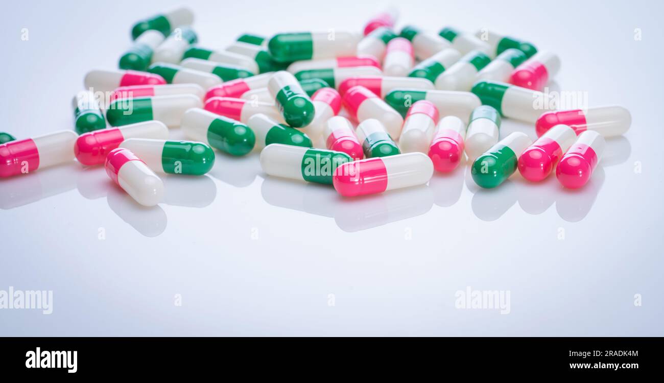 Capsules pill spread on white background. Prescription drugs. Capsule ...
