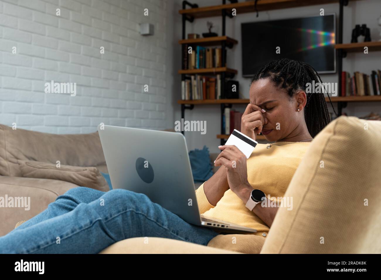 Stolen information in payment process. Confused female hold plastic bank credit card unable to ...