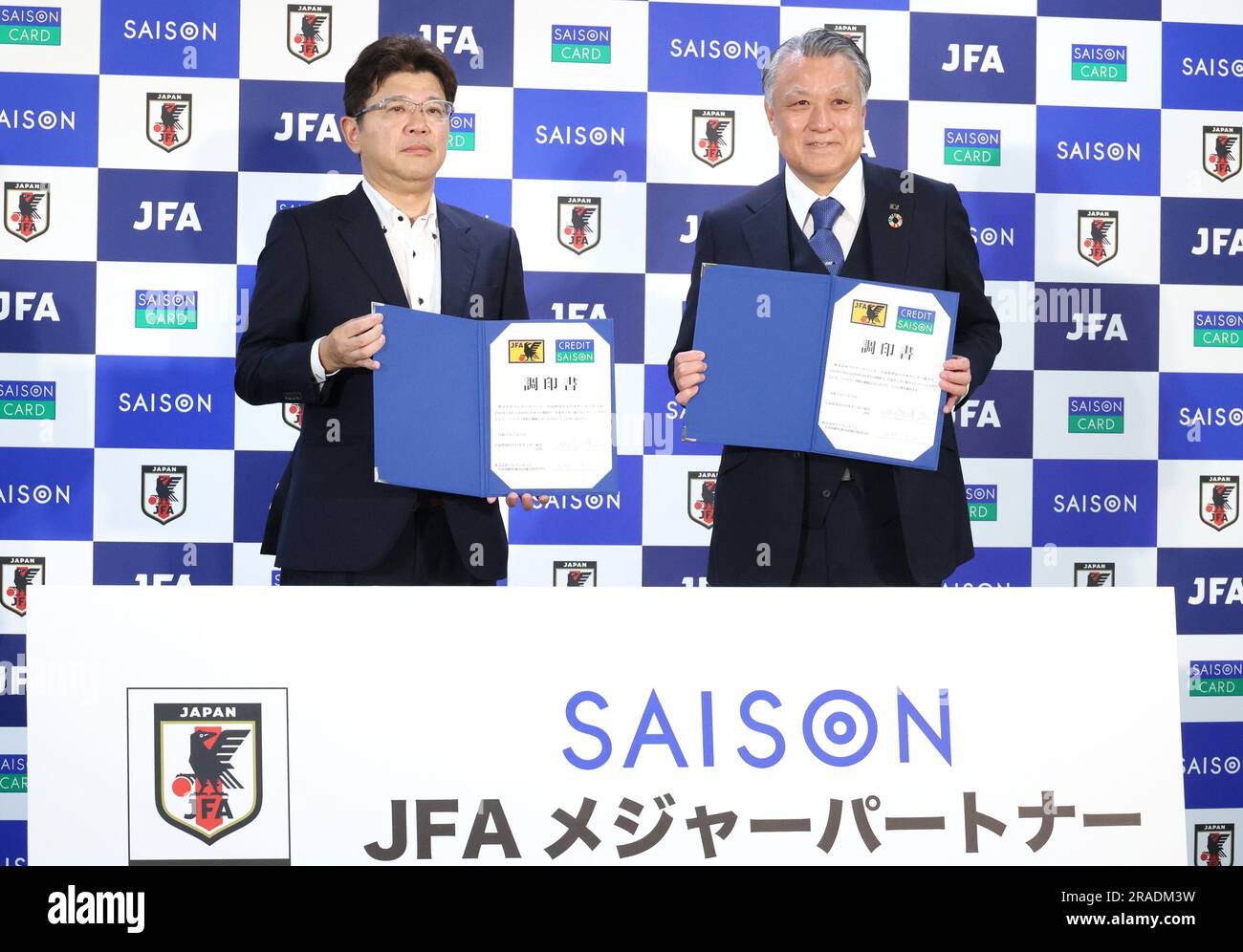 Tokyo, Japan. 3rd July, 2023. Japan Football Association (JFA) president Kozo Tashima (R) and ...