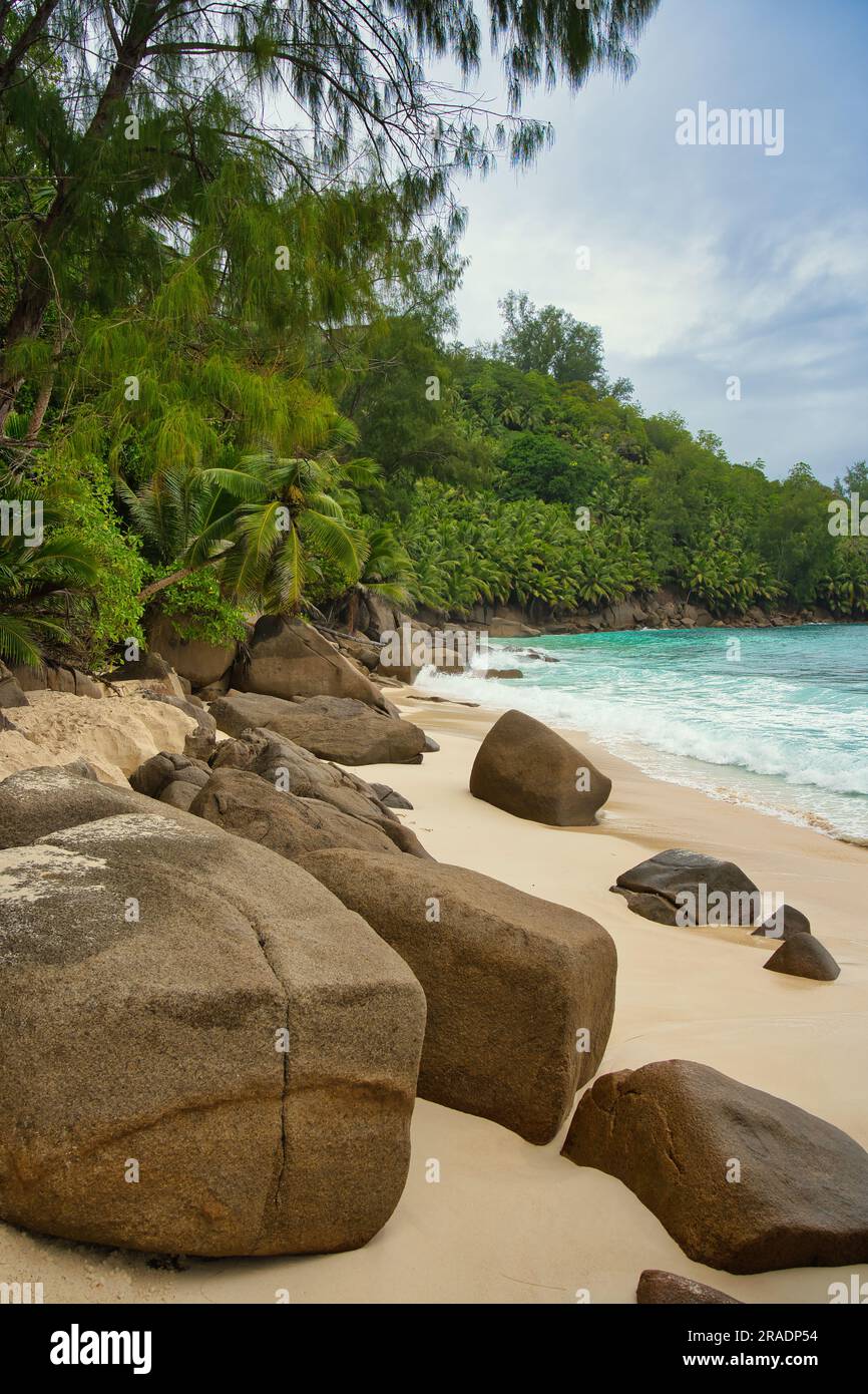 Beautiful rock boulders and white sandy beach of intendance, Mahe ...