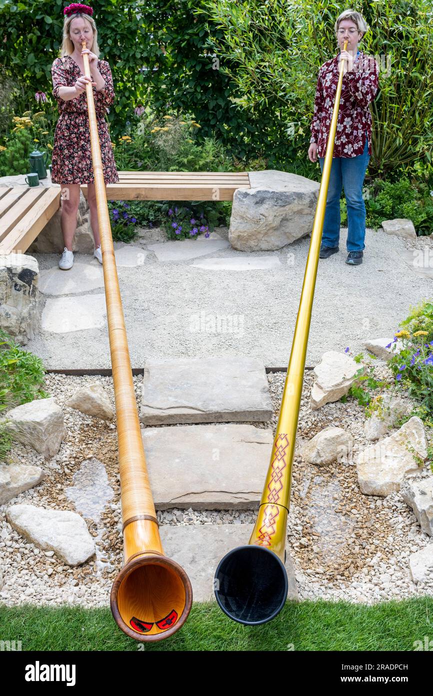 London, UK. 3 July 2023. Musicians play Swiss alphorns, an instrument traditionally connected ...