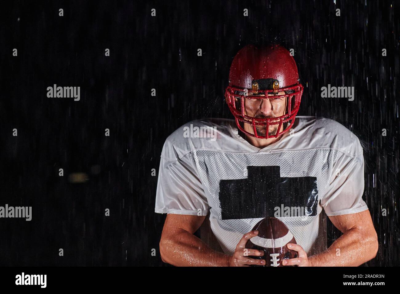 American Football Field: Lonely Athlete Warrior Standing on a Field ...