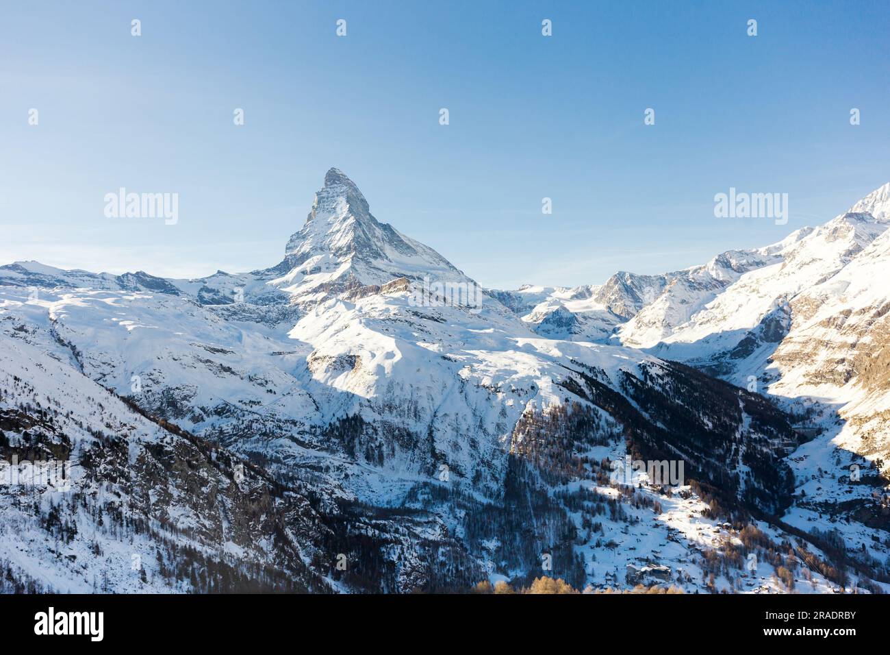 Snowy mountain Matterhorn during the day in winter. Zermatt, swiss alps ...