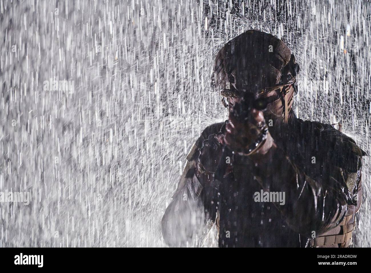 Army soldier in Combat Uniforms with an assault rifle, plate carrier ...