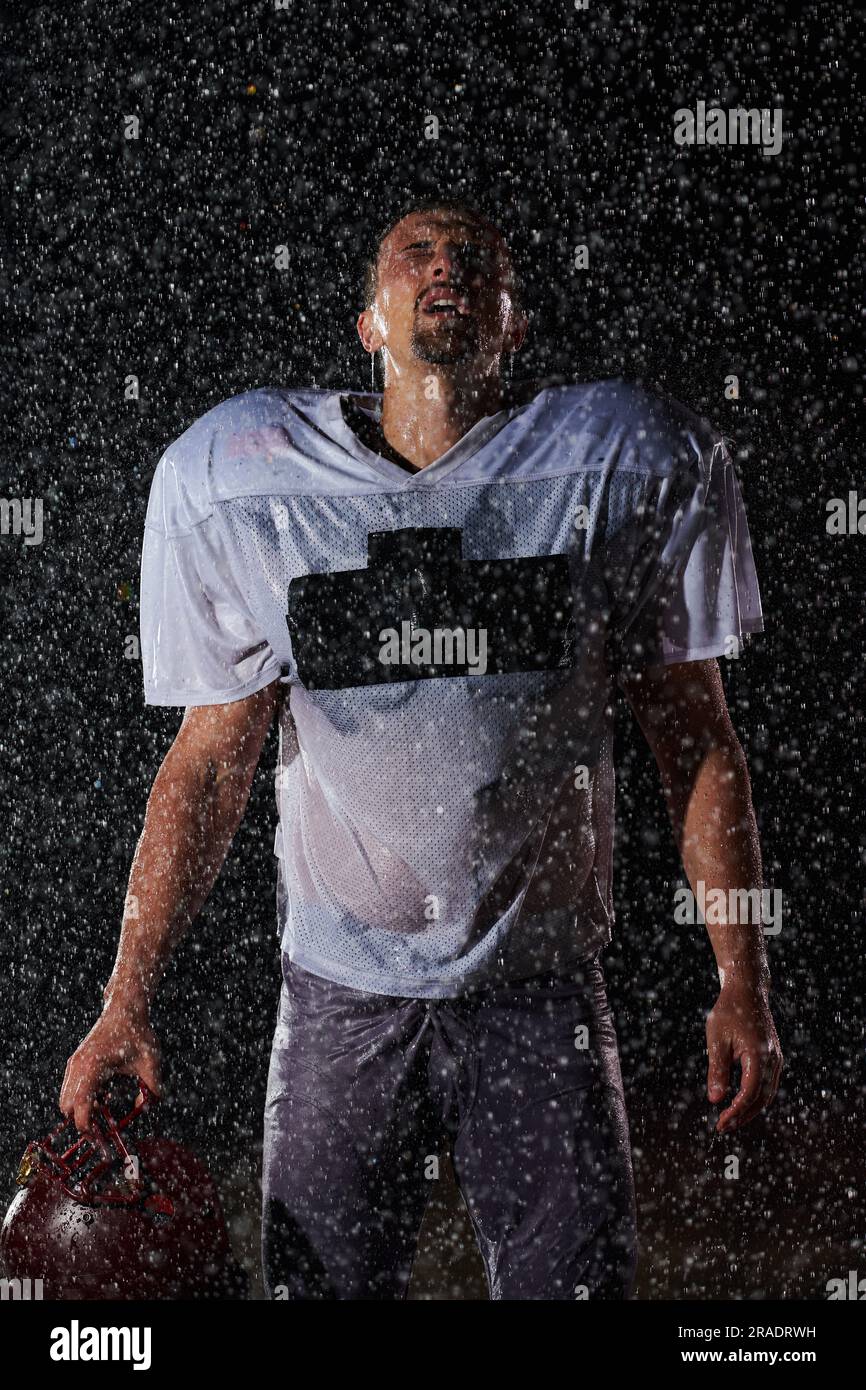 American Football Field: Lonely Athlete Warrior Standing on a Field ...