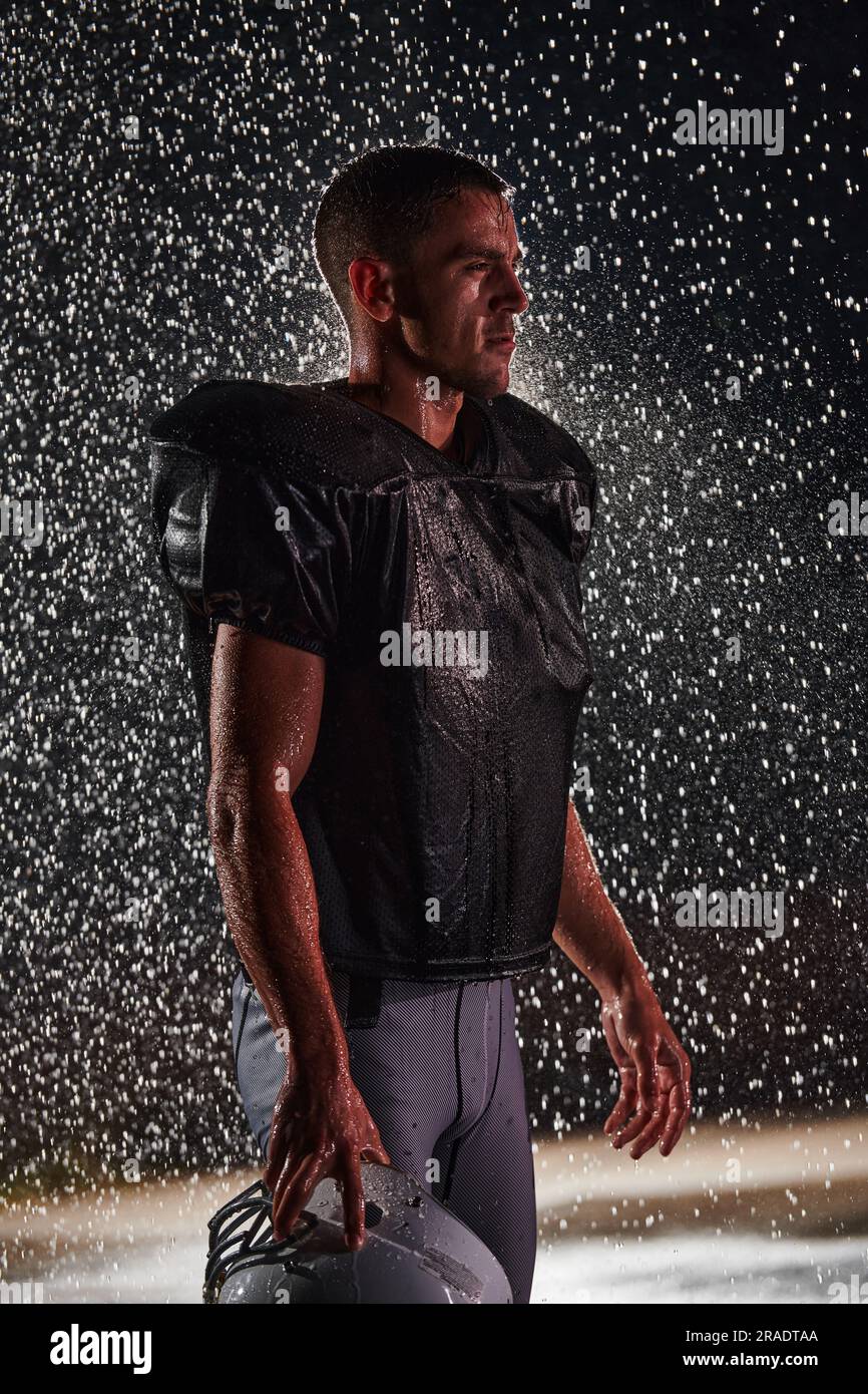 American Football Field: Lonely Athlete Warrior Standing on a Field ...