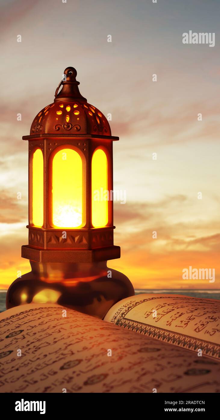 Quran and Arabic lamp with bright light with the sunset scene ...