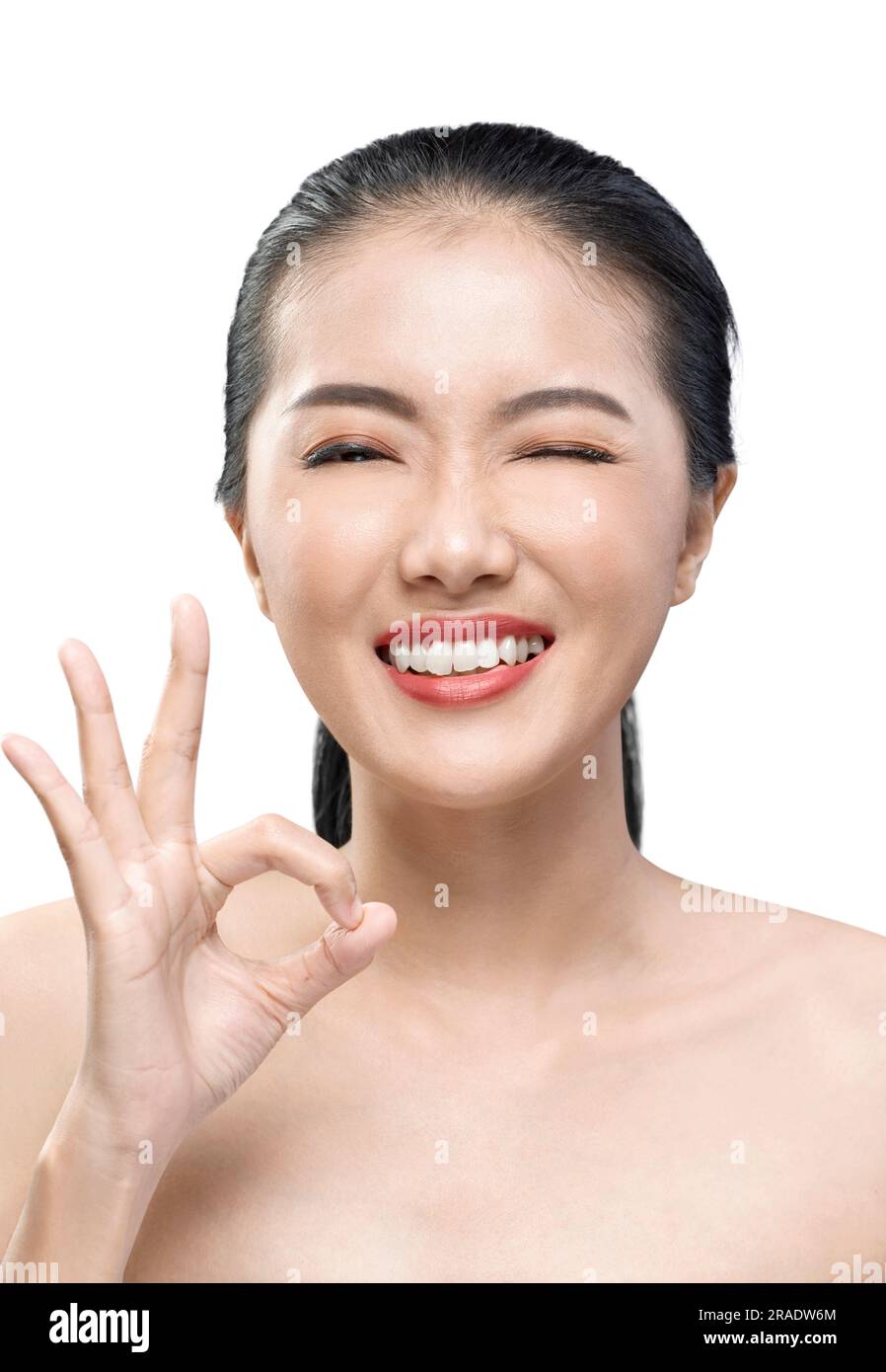 Portrait of Asian beauty woman wink with ok gesture isolated over white background Stock Photo ...