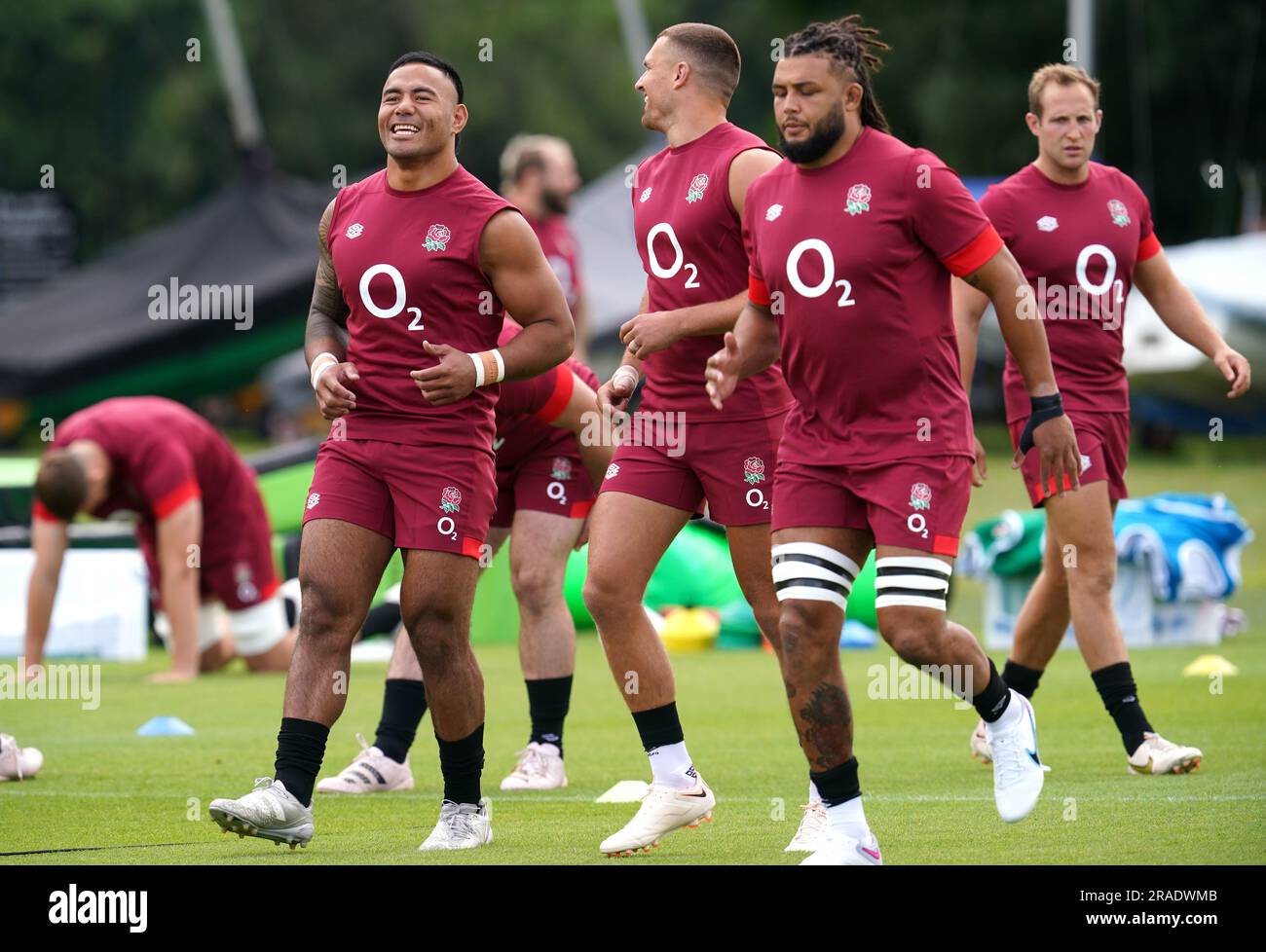 England's Manu Tuilagi (left) and Lewis Ludlam (second right) during a ...