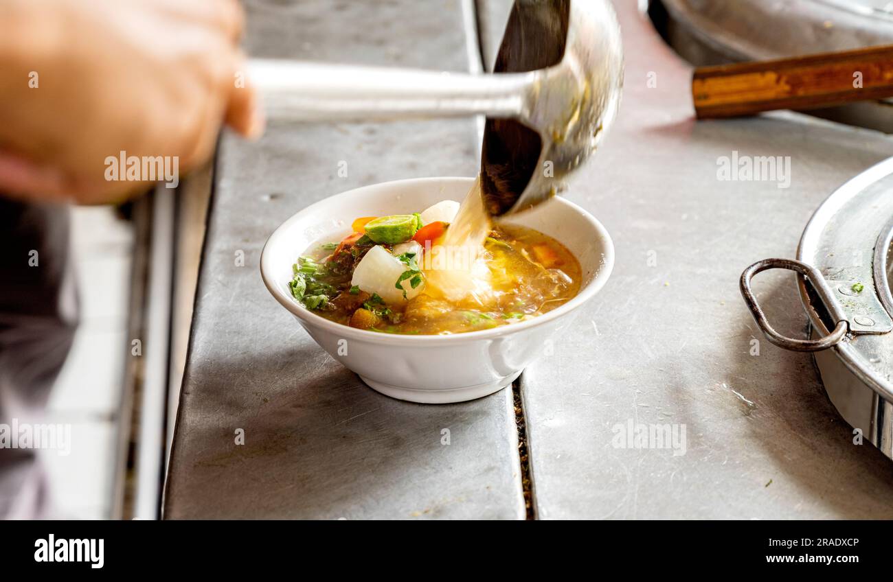 Chicken soup (Soto Ayam) is street food on Suryakencana Street ...