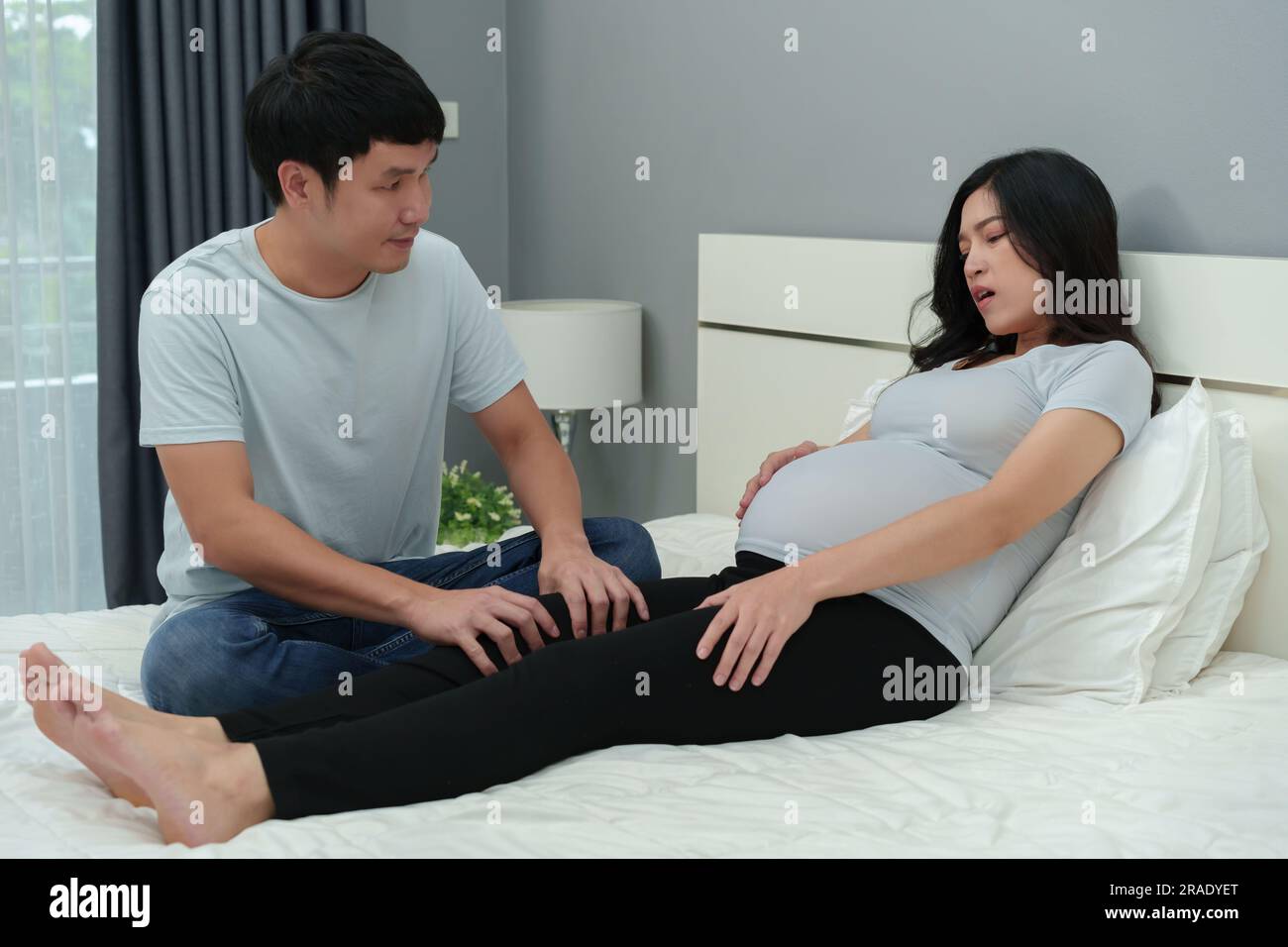 Couple touching legs hi-res stock photography and images - Alamy